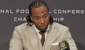 Video: Larry Fitzgerald jabs his dad over phone ringing during postgame ...