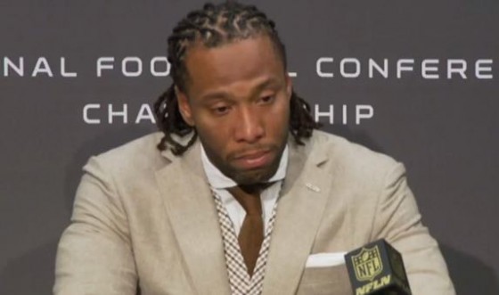 Video: Larry Fitzgerald jabs his dad over phone ringing during postgame ...