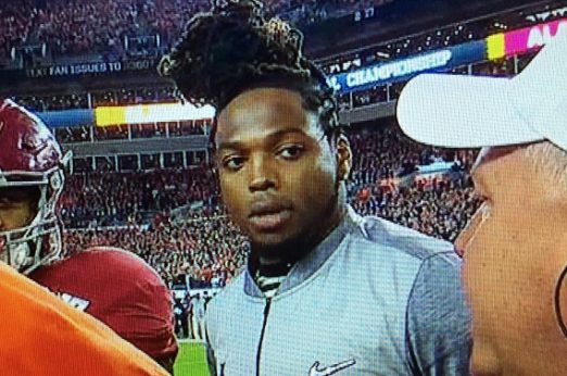 Derrick Henry and his hair are supporting Alabama