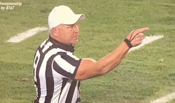 Buff referee Mike Defee and his muscles steal the show