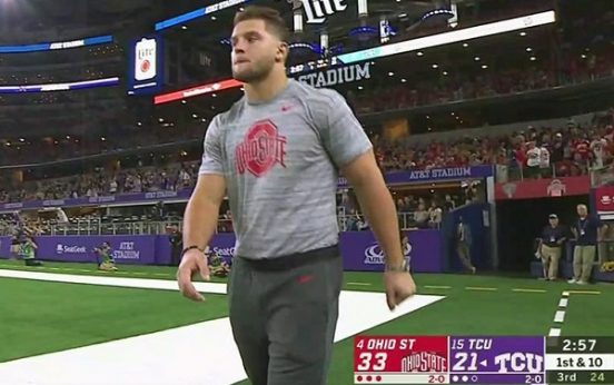 Nick Bosa in street clothes after exiting Ohio State game with groin injury