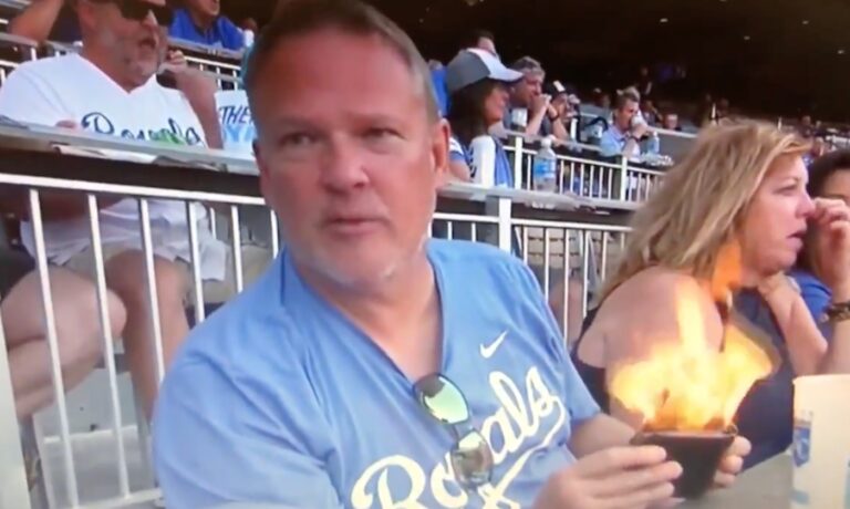 Video: Royals fan goes viral for flaming wallet