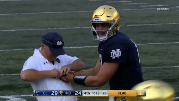 Video: Jack Coan had finger popped in before throwing game-winning TD