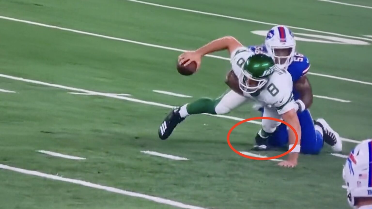 Aaron Rodgers shown in walking boot after suffering ankle injury