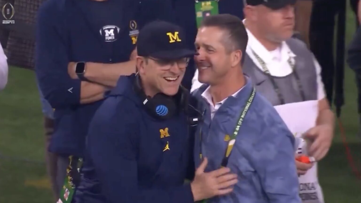 Jim Harbaugh shares nice moment with brother John during title game