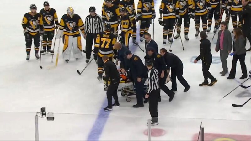 NHL referee removed on stretcher after terrifying collision