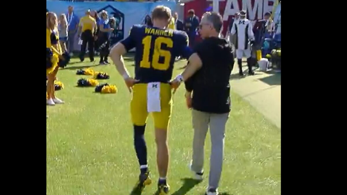 Michigan QB Davis Warren knocked out of bowl game