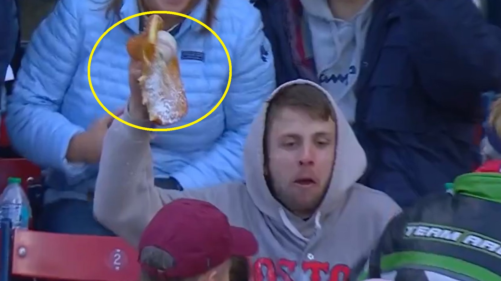 Red Sox fan miraculously catches foul ball using his food