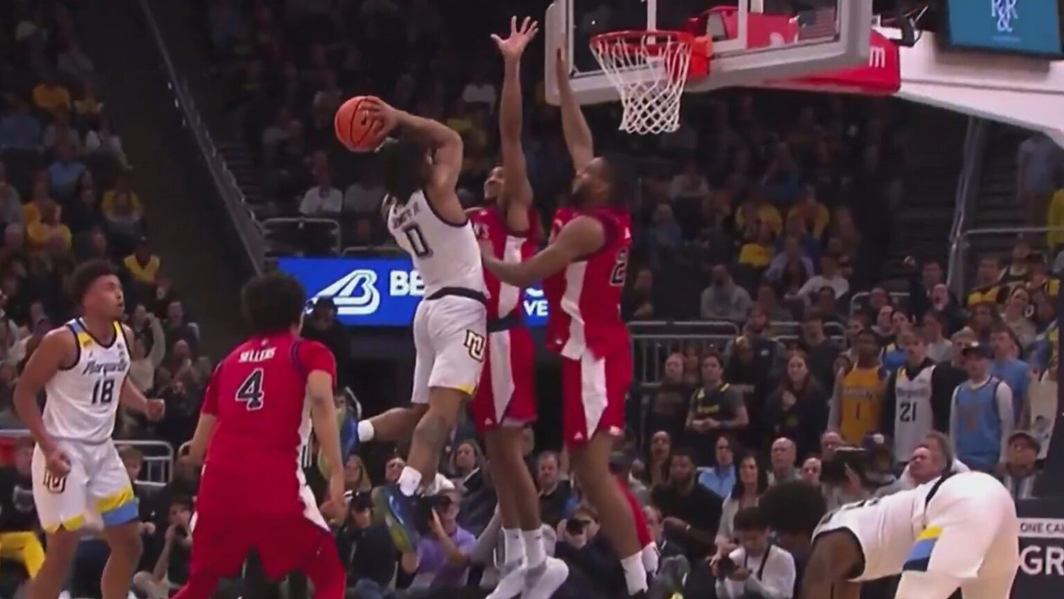 Nigel James Jr. pulls off a nasty acrobatic layup during Marquette-St ...